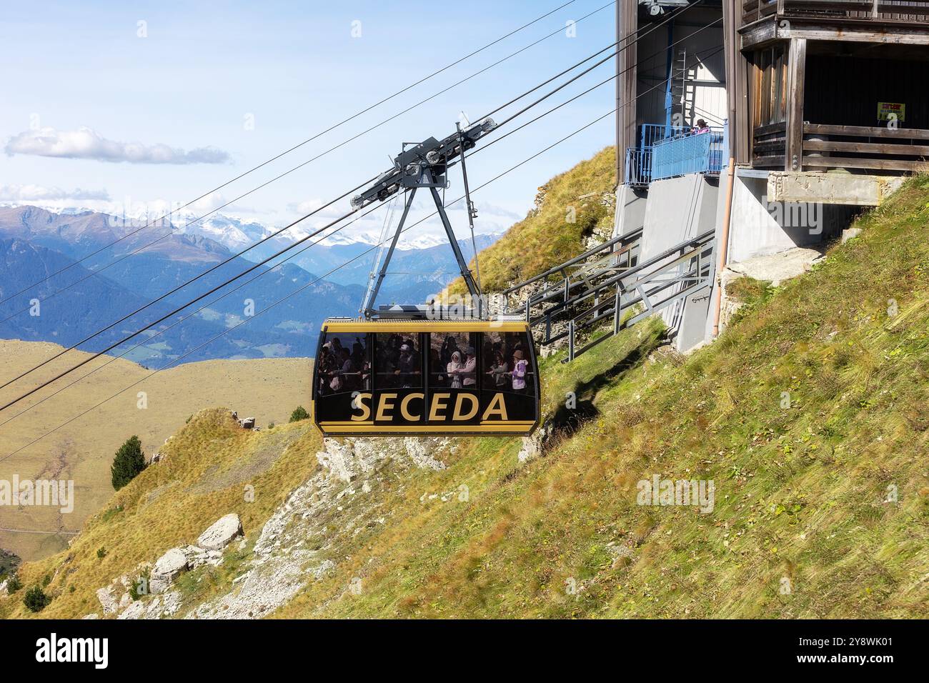 Ortisei, Italy - September 29, 2024: Cable car arriving to Seceda in ...