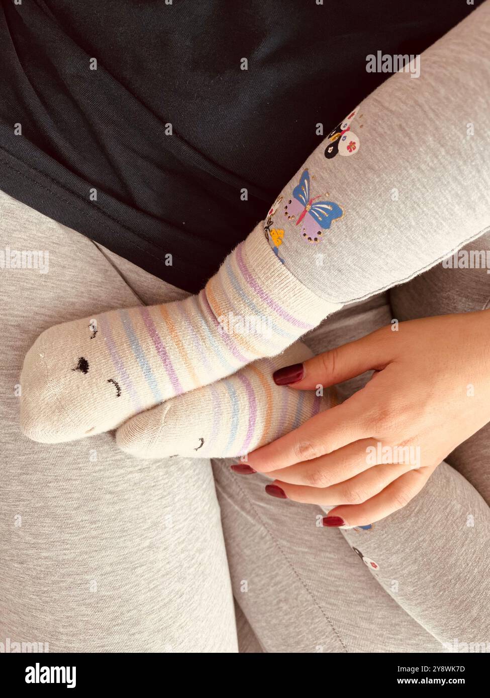 Cozy hygge pastel colourful newborn baby socks on neutral beige ...