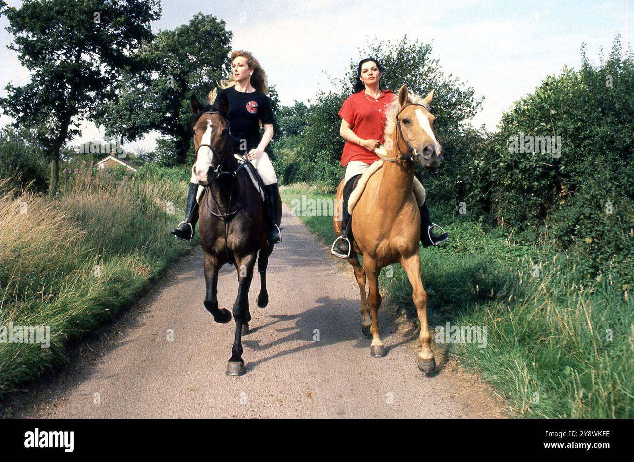 Cheryl Campbell and friend horse riding 1980 Stock Photo - Alamy