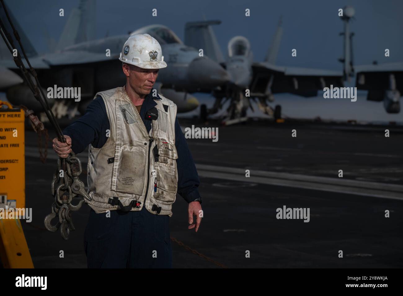 PACIFIC OCEAN (Oct. 1, 2024) U.S. Navy Lt. j.g. Koda Freeman removes ...