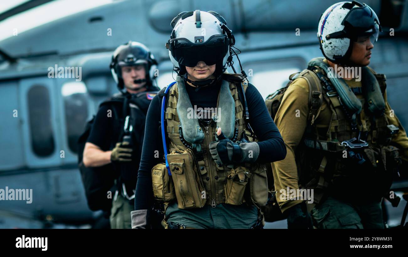 Lt. Alysia Greiner, middle, from Salt Lake City, Hospital Corpsman 1st ...