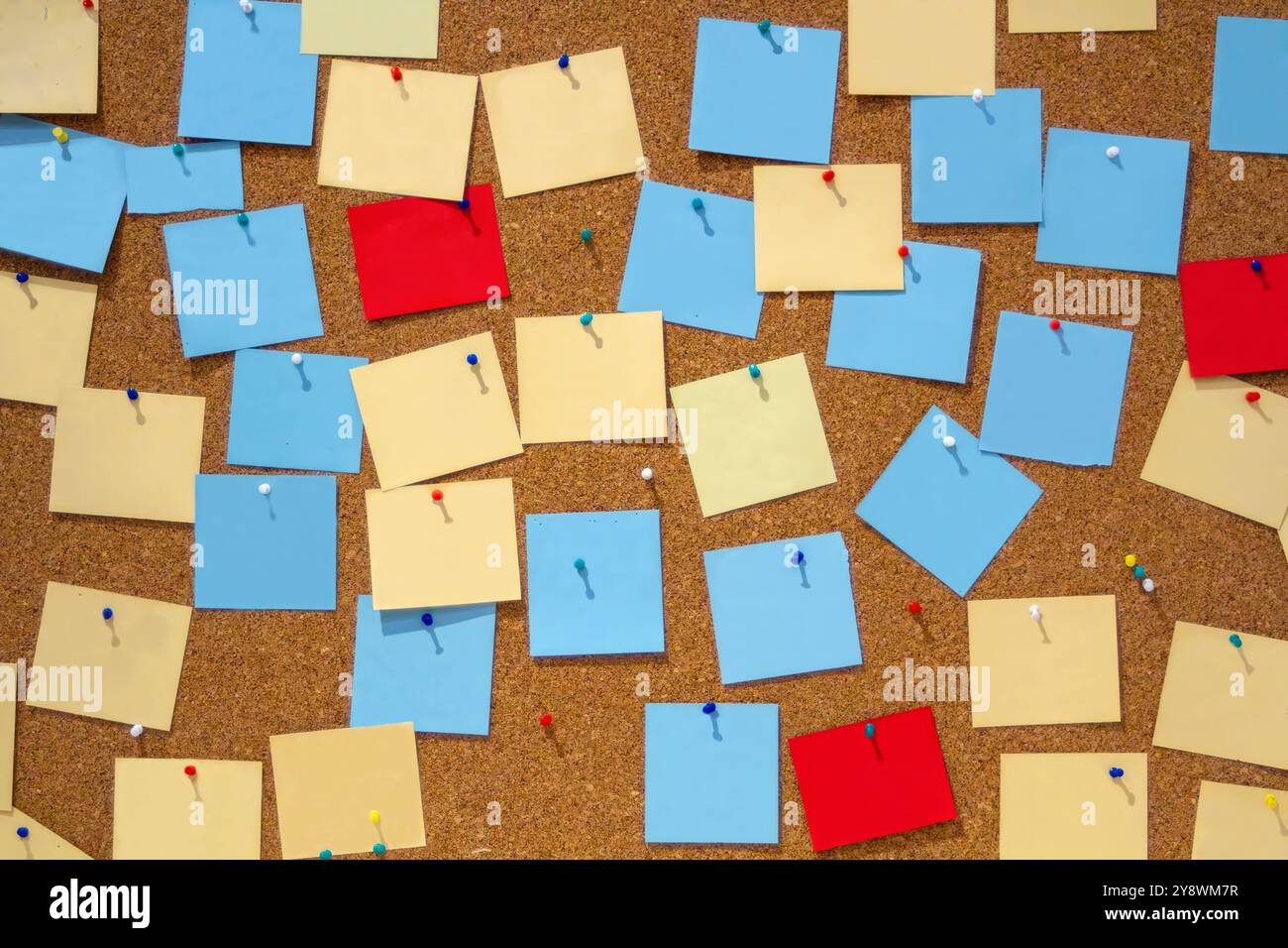 Colorful Sticky Notes on a Cork Bulletin Board Stock Photo - Alamy