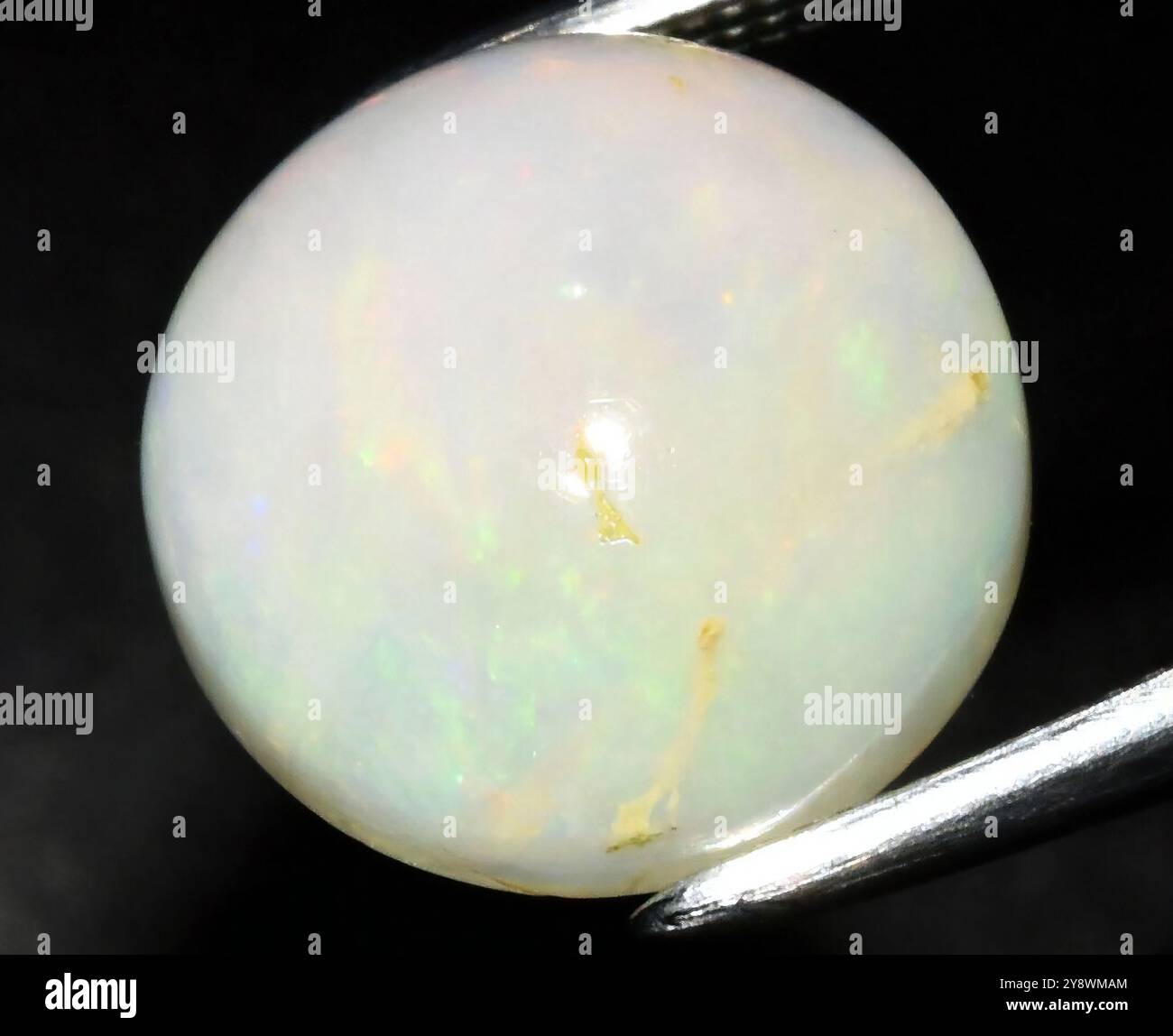 Captivating Opal Gemstone with Iridescent Colors and Unique Inclusions ...