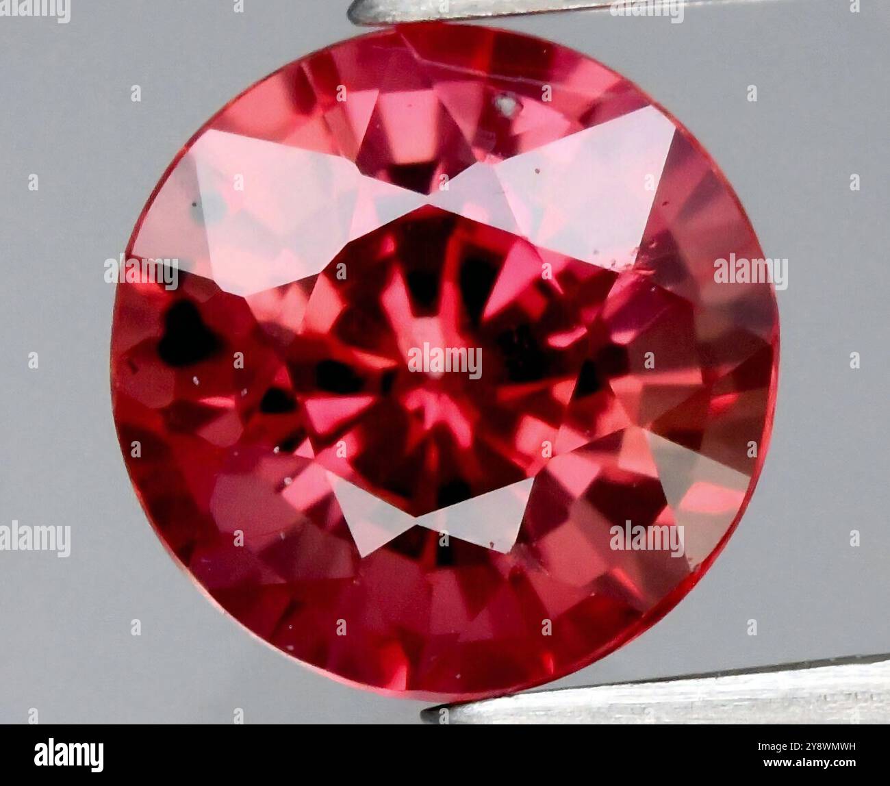 Brilliantly Cut Deep Red Gemstone Displaying Exceptional Clarity and ...