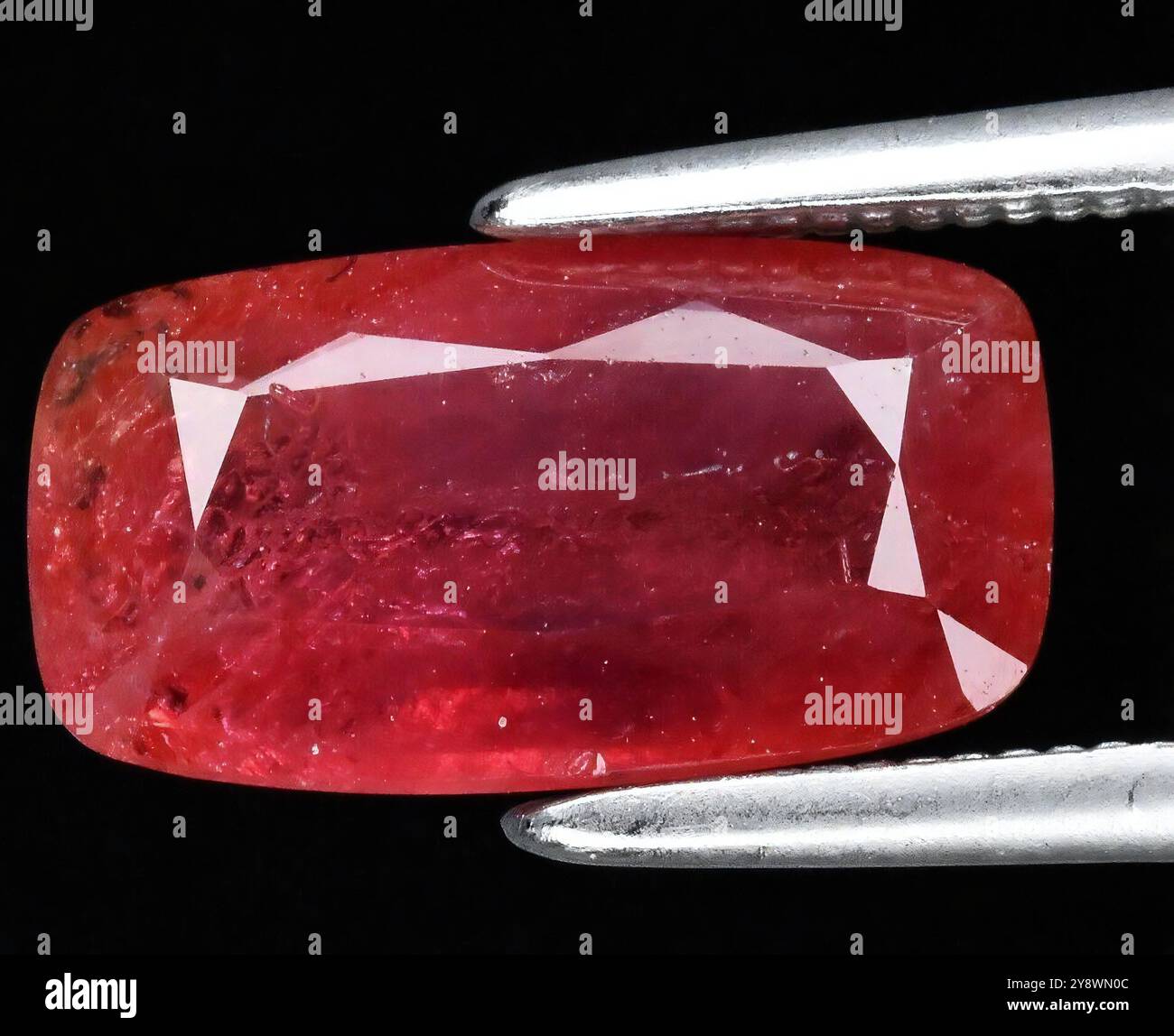 Radiant Ruby Gemstone Captured in Brilliant Facets Stock Photo - Alamy