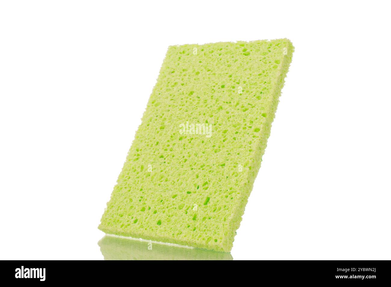 One absorbent sponge, macro, isolated on white background Stock Photo ...