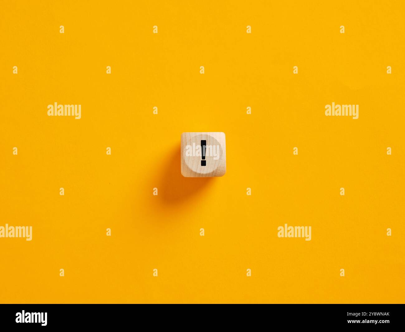 Attention, caution, warning, alert or danger concept. Wooden cube on a ...
