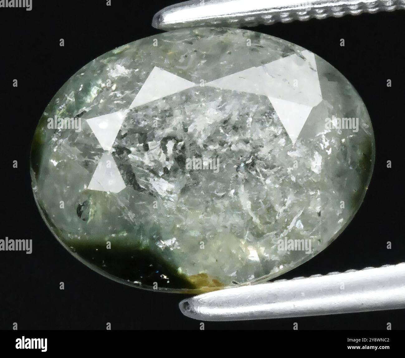 Radiant Green Quartz Gemstone with Intricate Inclusions and Unique ...