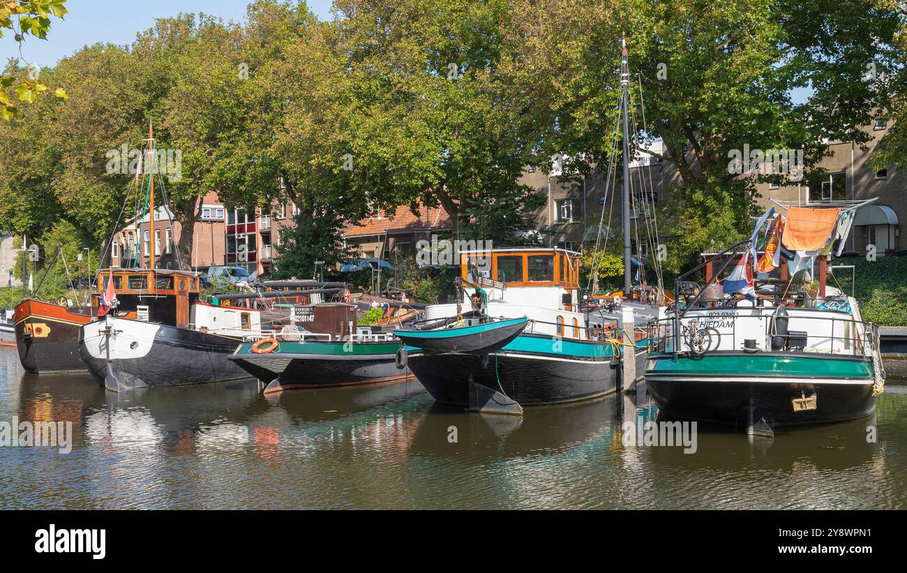 Inland boats along the quay of the Nieuwe Haven in the Dutch city of ...