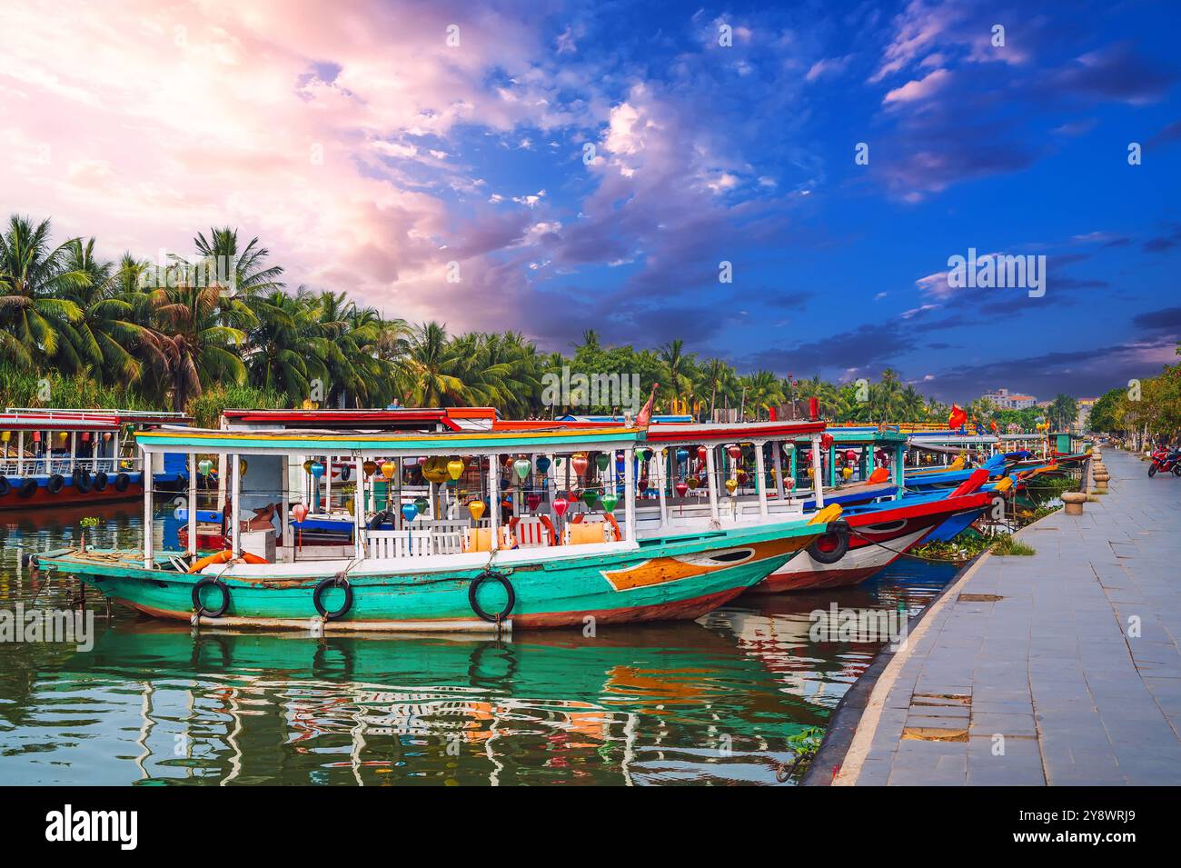 Traditional Vietnamese boats on the Thu bon river in the old town in ...