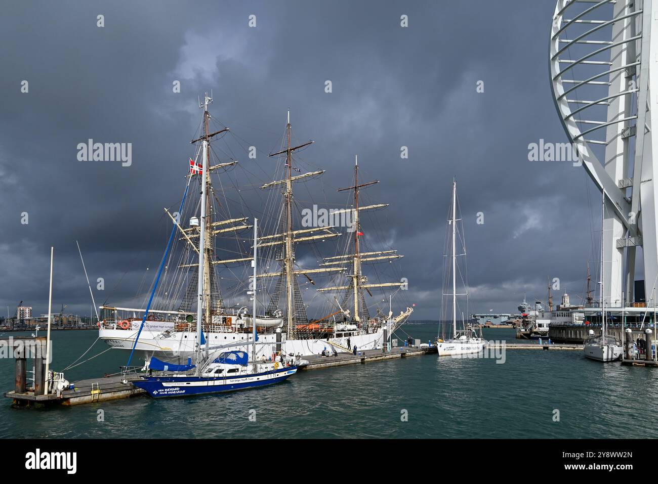 Sørlandet and smaller sailing ships moored at Gunwharf Quays under the ...