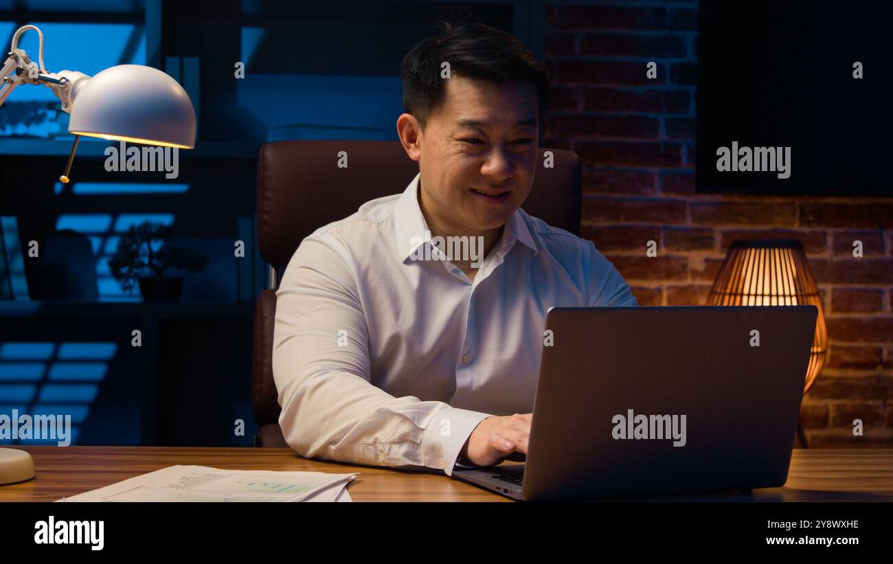 Moving shot business worker Korean male open laptop start work Asian ...