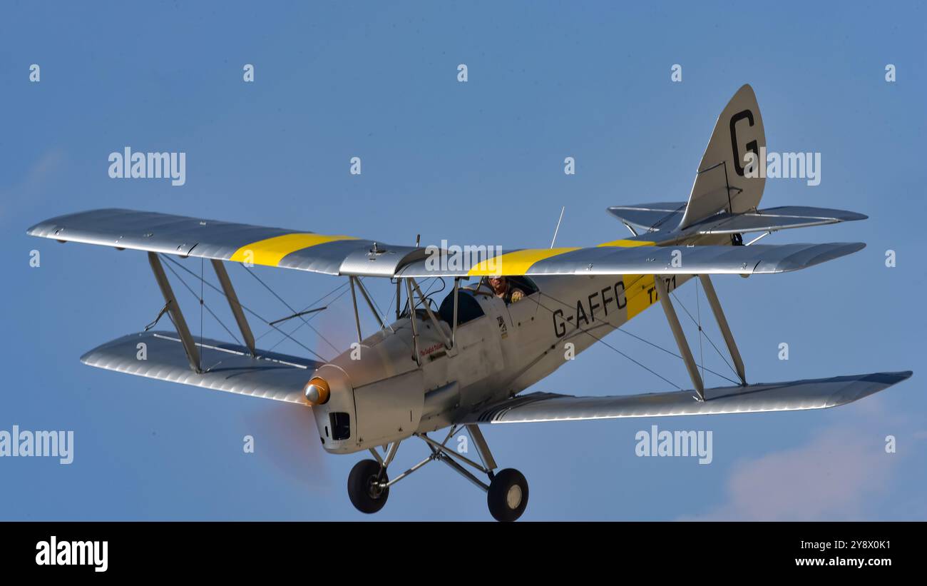 Biplane nostalgic vintage aircraft on display flight Stock Photo - Alamy