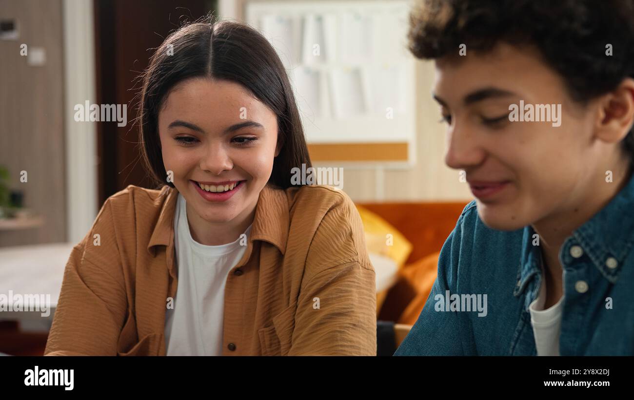 Two students friends pupils teamwork friendship Caucasian girl female ...