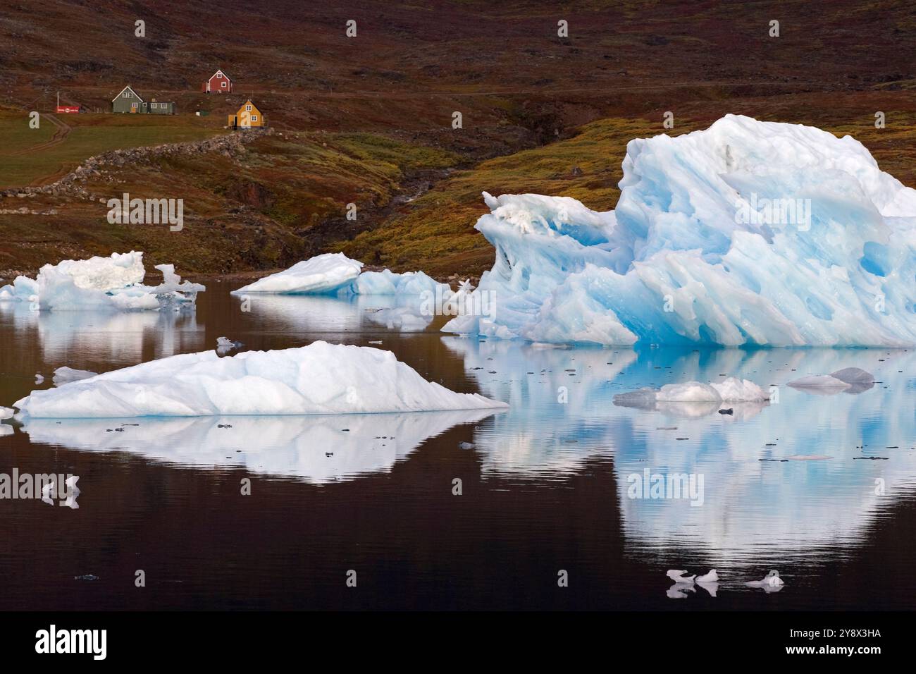 Iceberg and Farm in Eqaluit Ilua, Greenland Stock Photo - Alamy