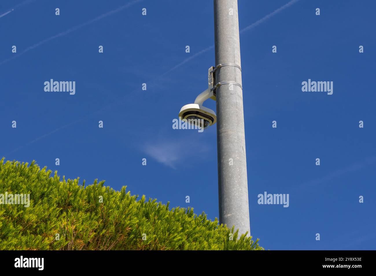 Modern security camera monitoring the area, providing safety and ...