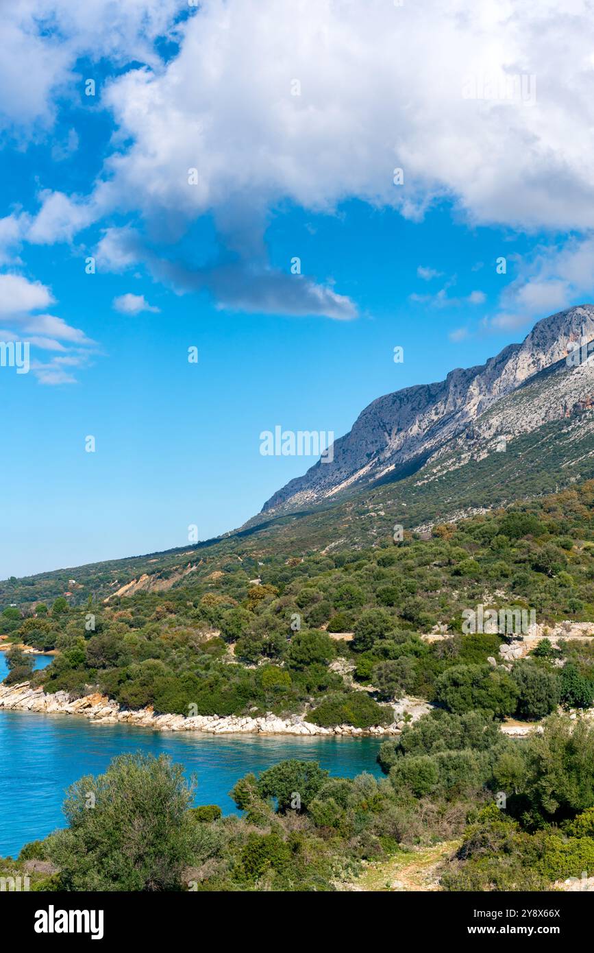 Coastal landscape of wild beaches, trees and mountains in Greece Stock ...