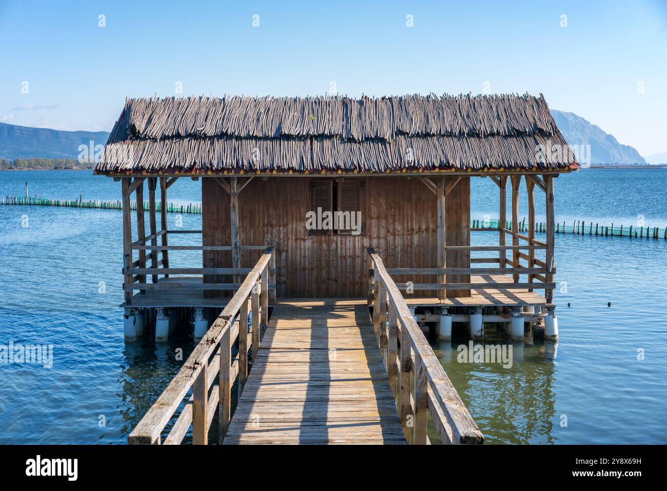 Traditional wooden house on the middle of Klisova lagoon in Greece ...