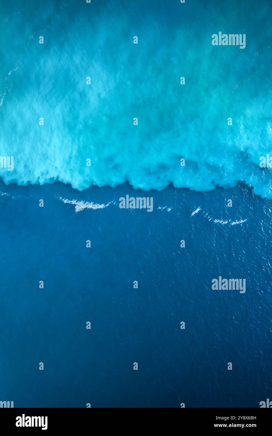 Drone top view of sea division between turquoise water and deep blue ...