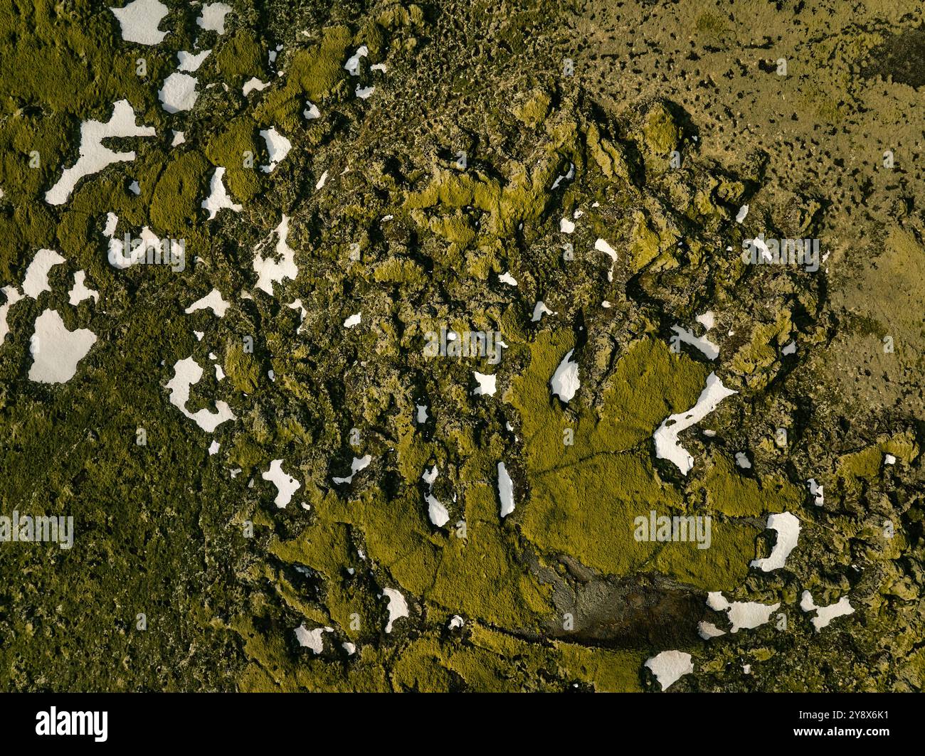 Frozen lava fields with snow in daytime Stock Photo - Alamy