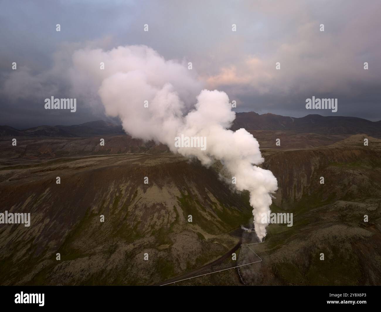 Volcanic terrain with thermal smoke emitting Stock Photo - Alamy