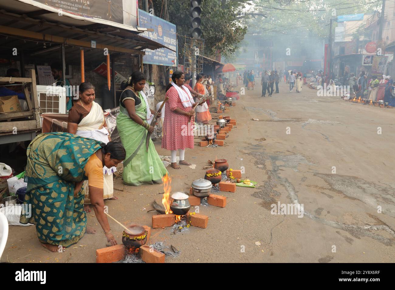 An offering to Goddess Attukal Devi | Pongala dishes Stock Photo - Alamy