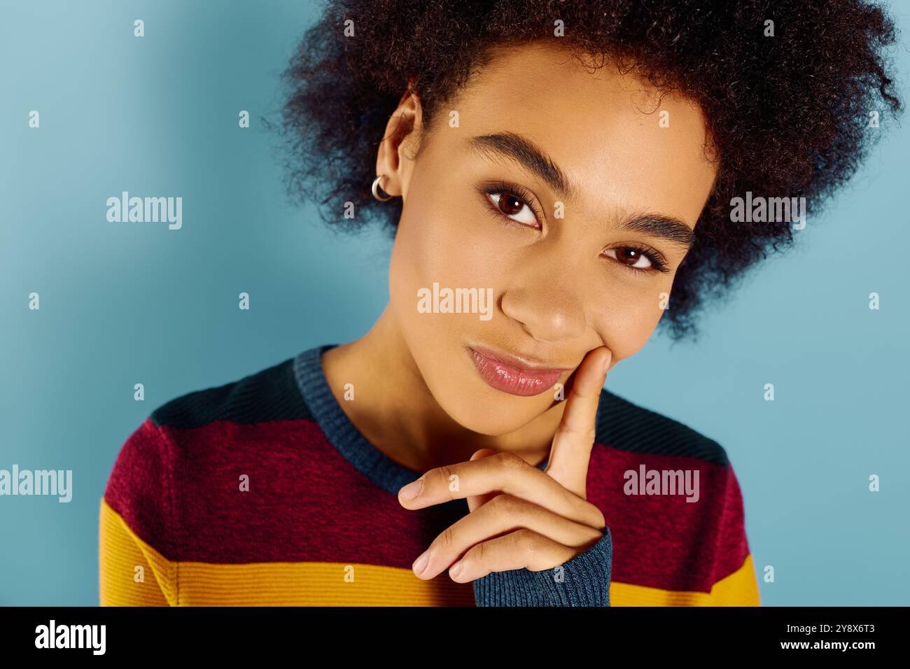 A young woman expresses deep emotions, reflecting thoughtfully with a ...