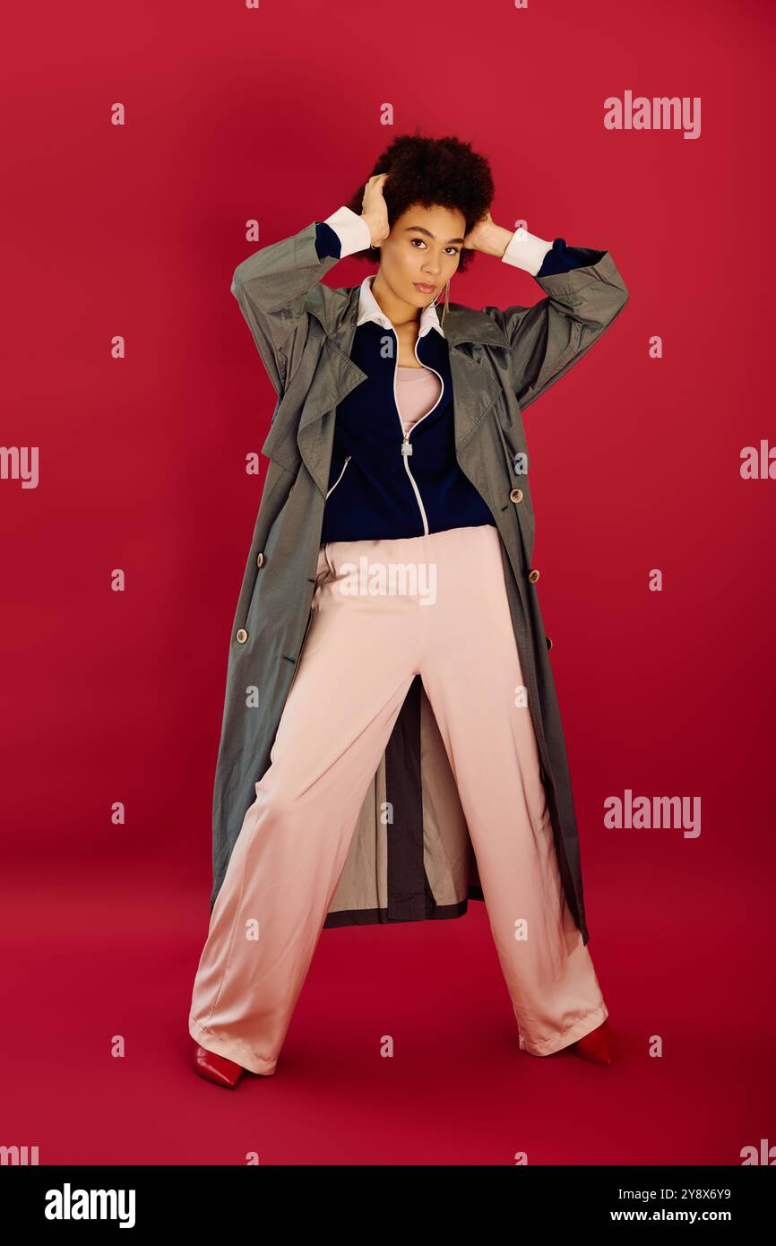 A young woman expresses her emotions in striking poses, dressed ...