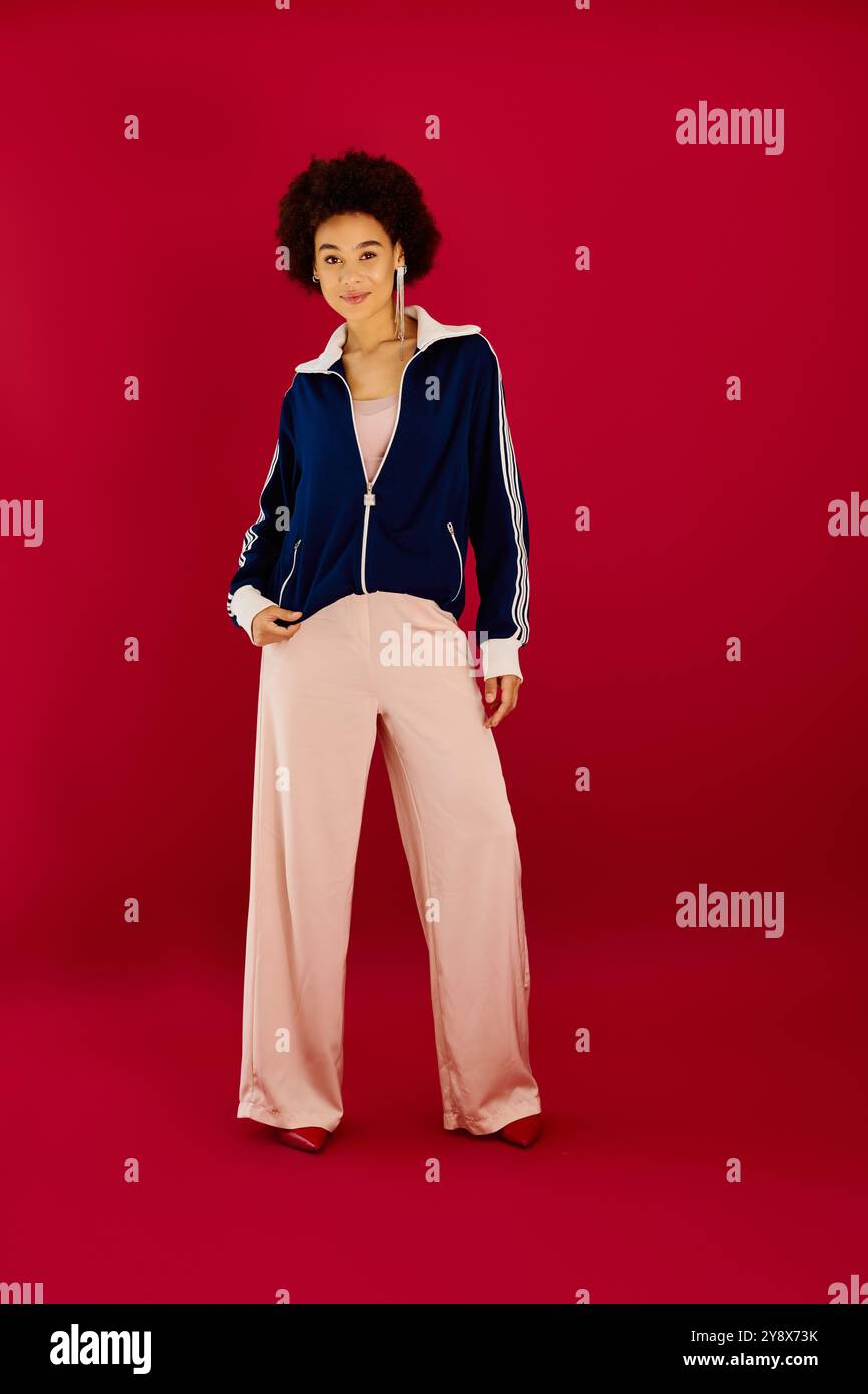 A young woman showcases her emotions with a bold outfit, radiating ...