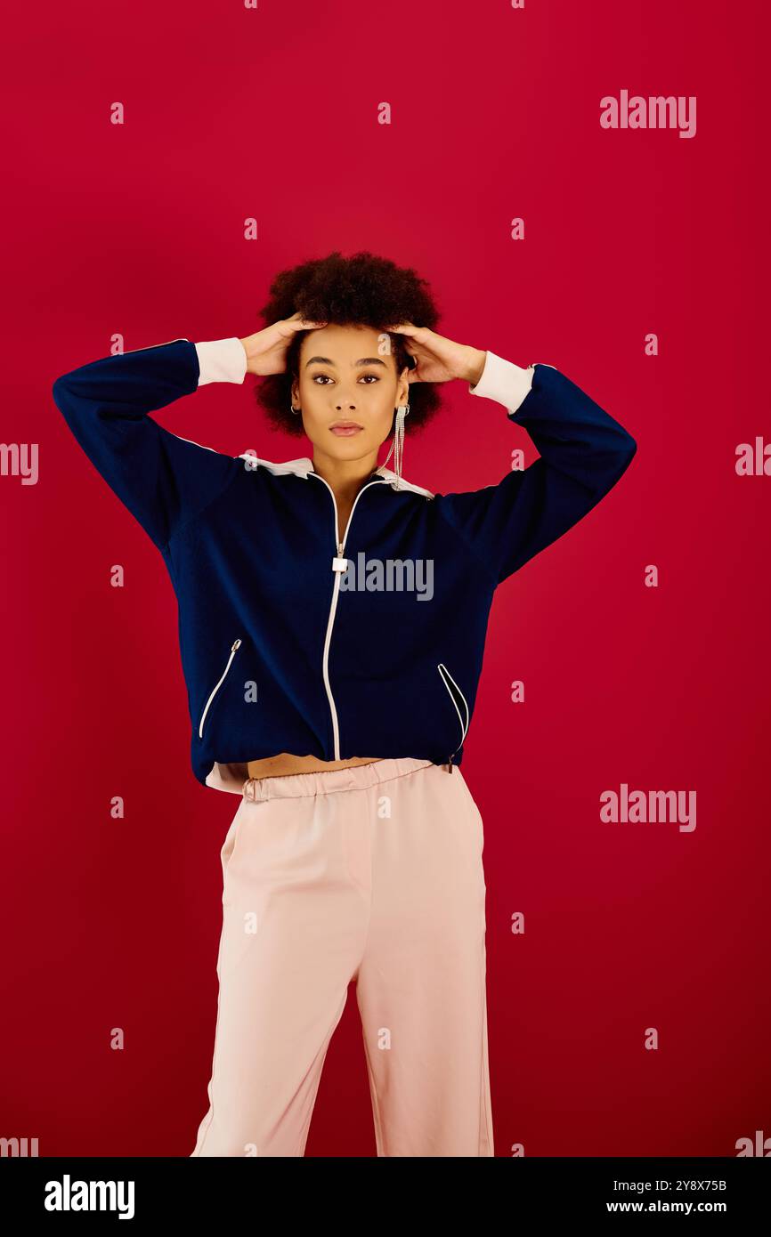 A young emotional woman showcases her feelings with creative poses and ...