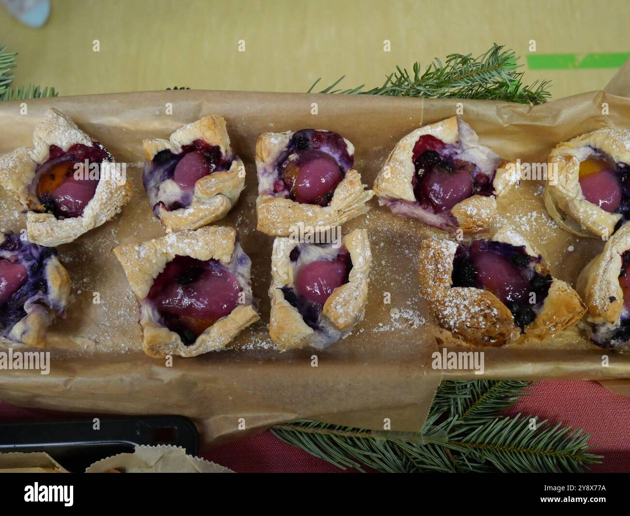 A crispy puff pastry cake filled with juicy cherries. The perfect blend ...