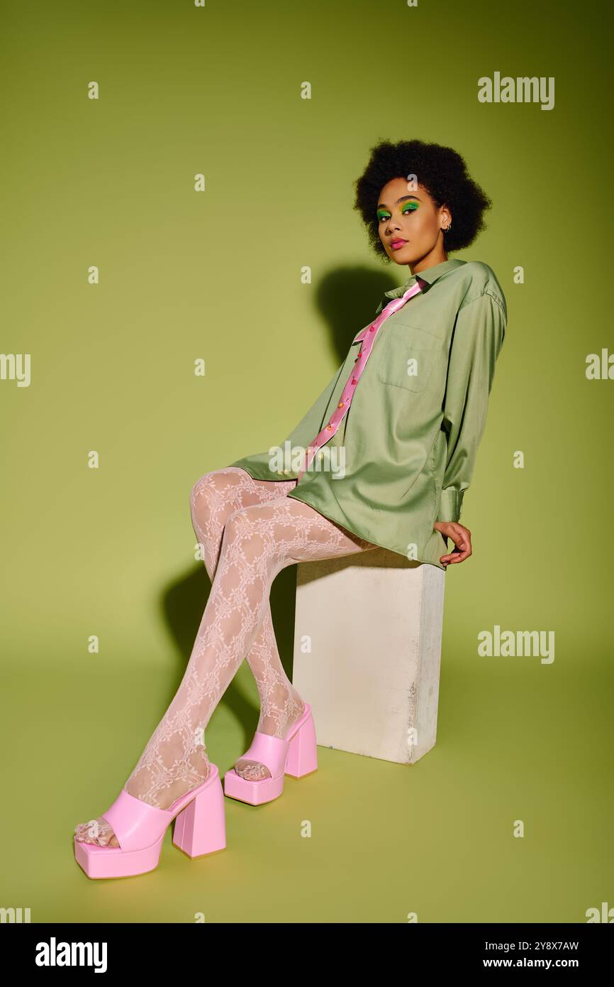 A young woman expresses deep emotions while showcasing a stylish outfit ...