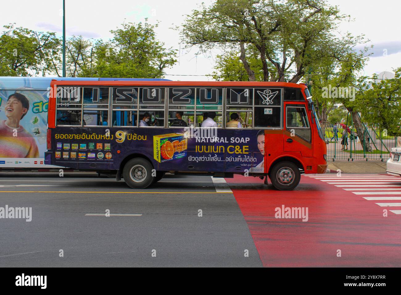 Bangkok. A very dated bus on city streets, this means of transport is ...