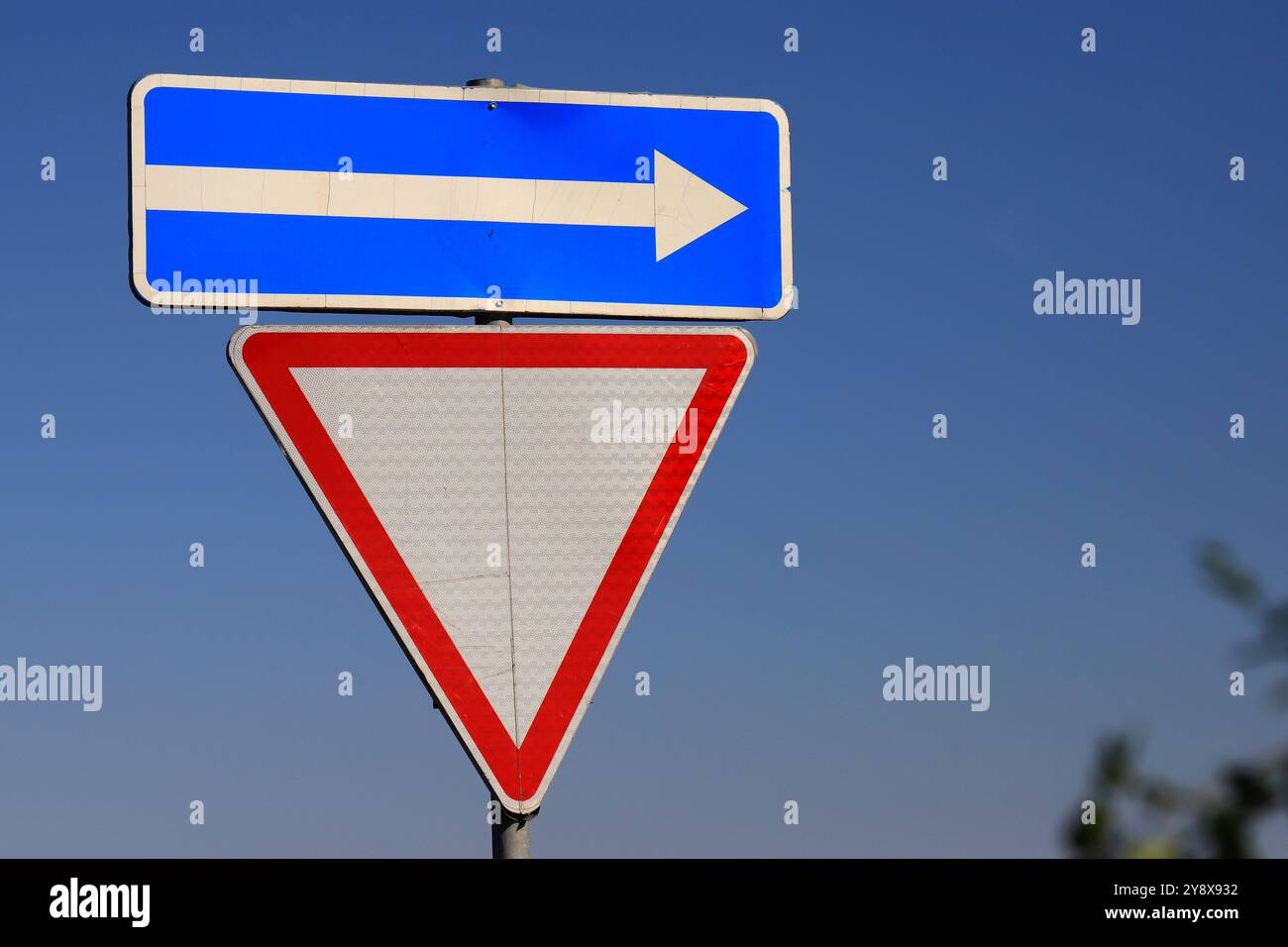 Road signs - give way and direction of movement for cars. Triangular ...