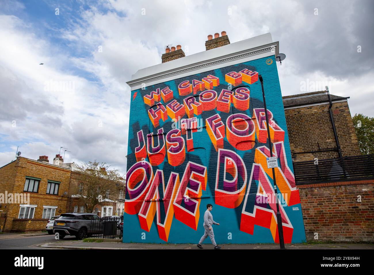 A victorian house in Brixton with the words "We Can Be Heroes Just For ...