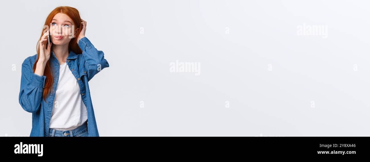 Unsure cute redhead girl troubled give final answer, talking on phone ...