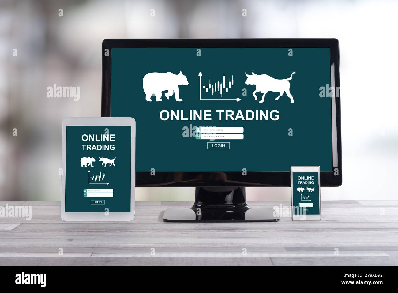 Online trading concept shown on different information technology ...