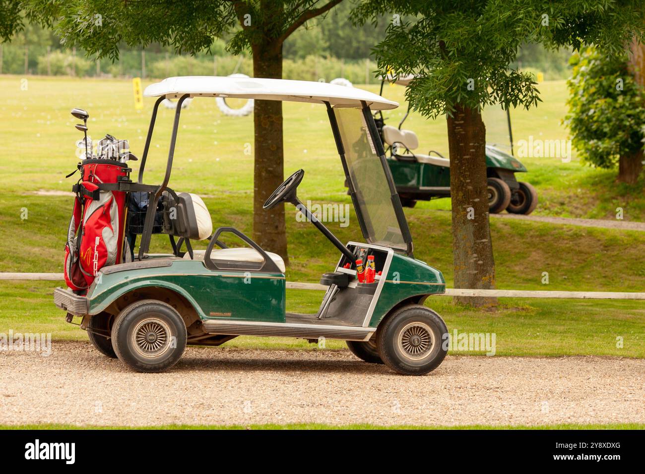 stationary golf buggy with bag on back & No driver Stock Photo - Alamy