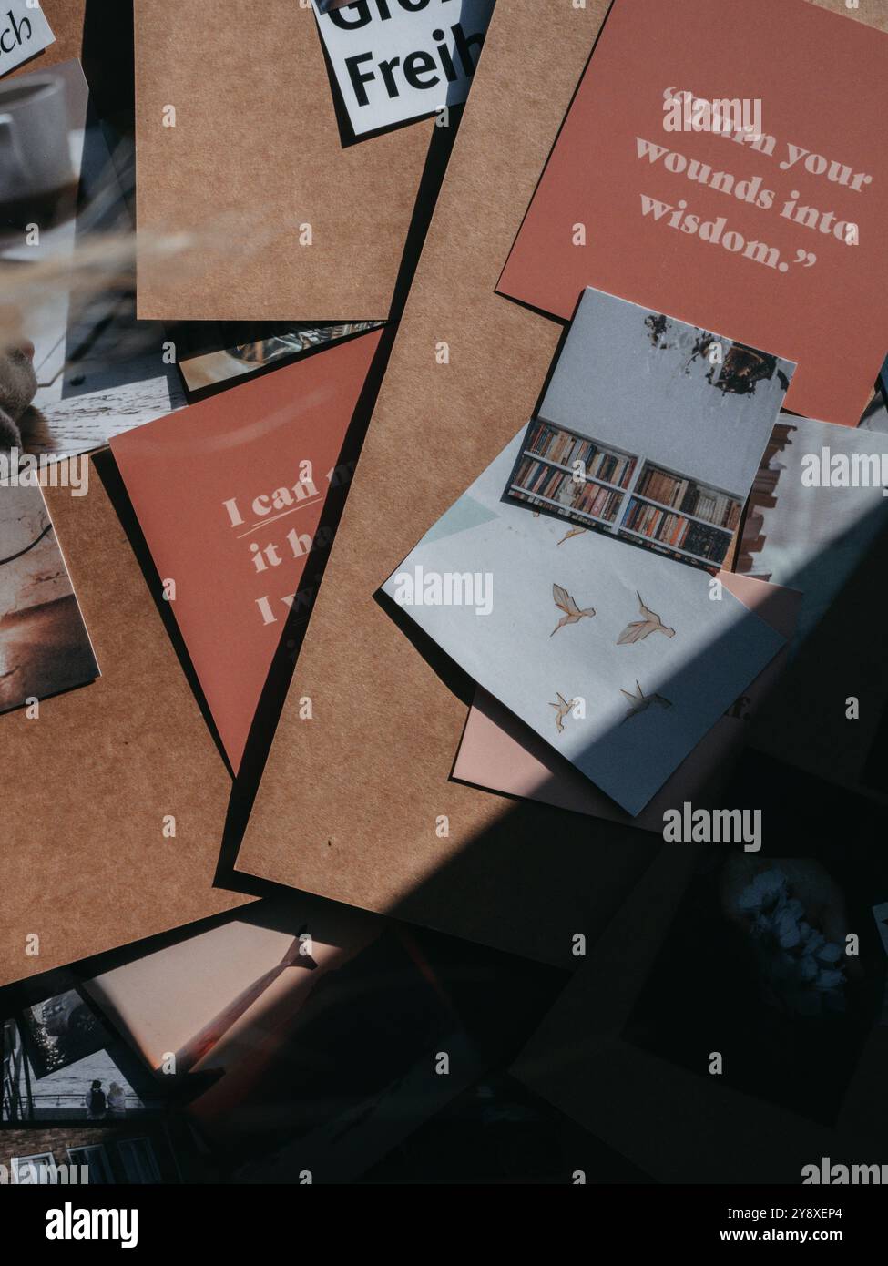 Close up shot of a cuts from magazines for a vision board, manifesting ...