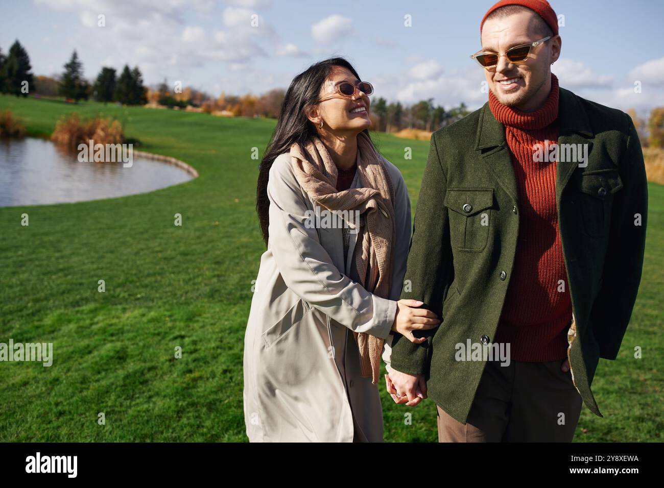 Amidst beautiful fall foliage, the couple shares laughter and affection ...