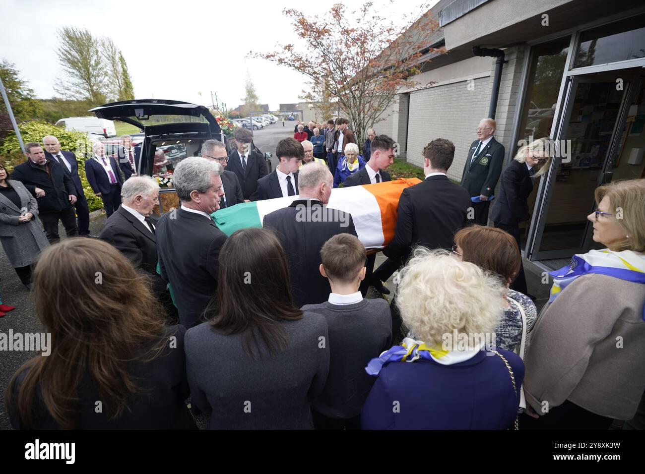 The coffin of former Fianna Fail minister Mary O'Rourke is carried into ...