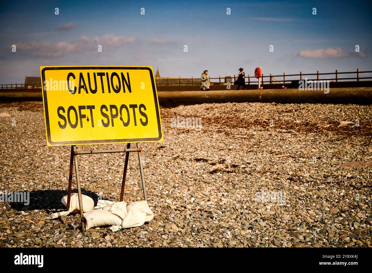 Warning sign on beach Stock Photo - Alamy