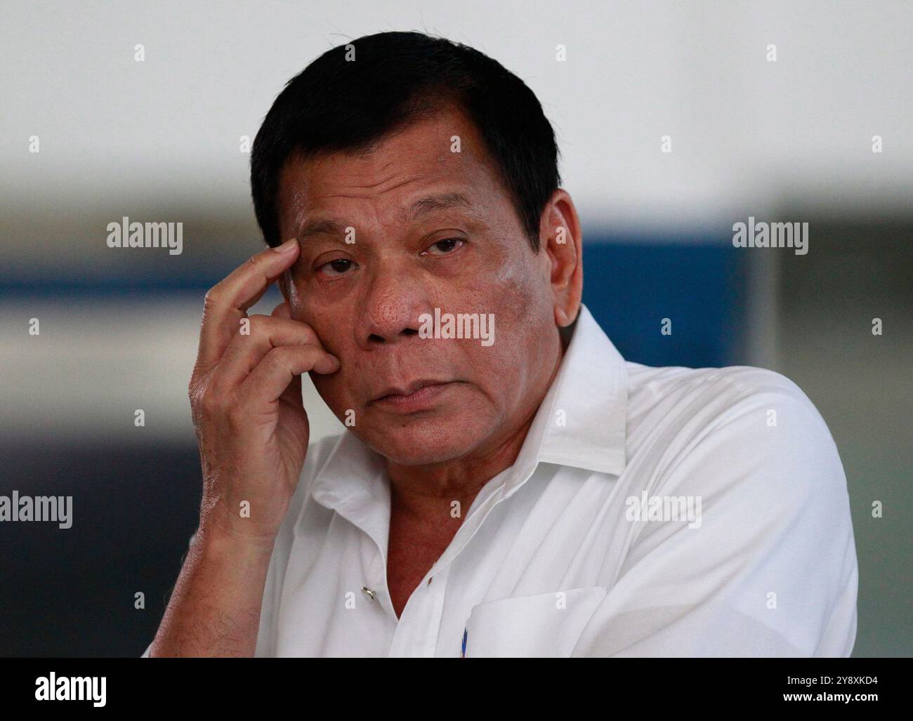FILE -Philippine President Rodrigo Duterte listens to a question from ...