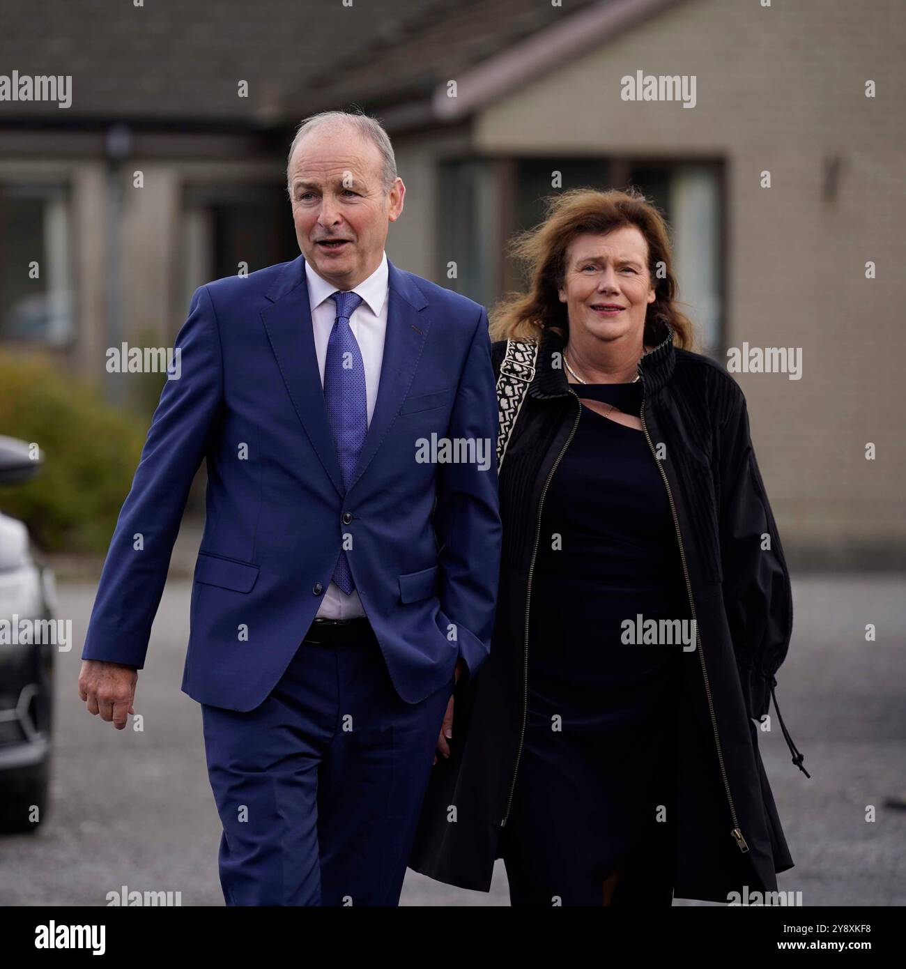 Tanaiste Micheal Martin and his wife Mary O'Shea arrive for the funeral ...