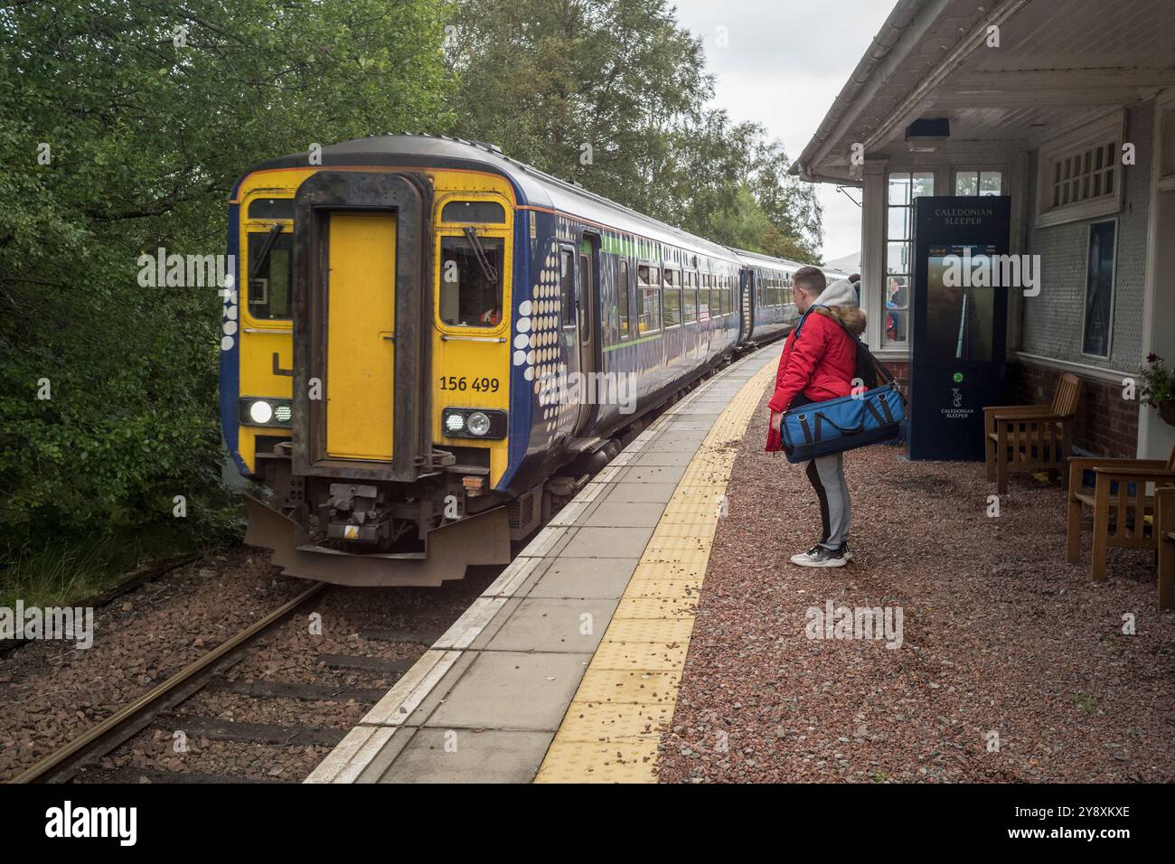 Train arriving at Bridge of Orchy train station, on the West Highland ...
