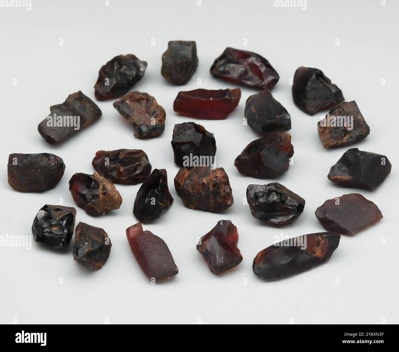 A Stunning Array of Raw Garnet Crystals Showcasing Nature's Rich Colors ...