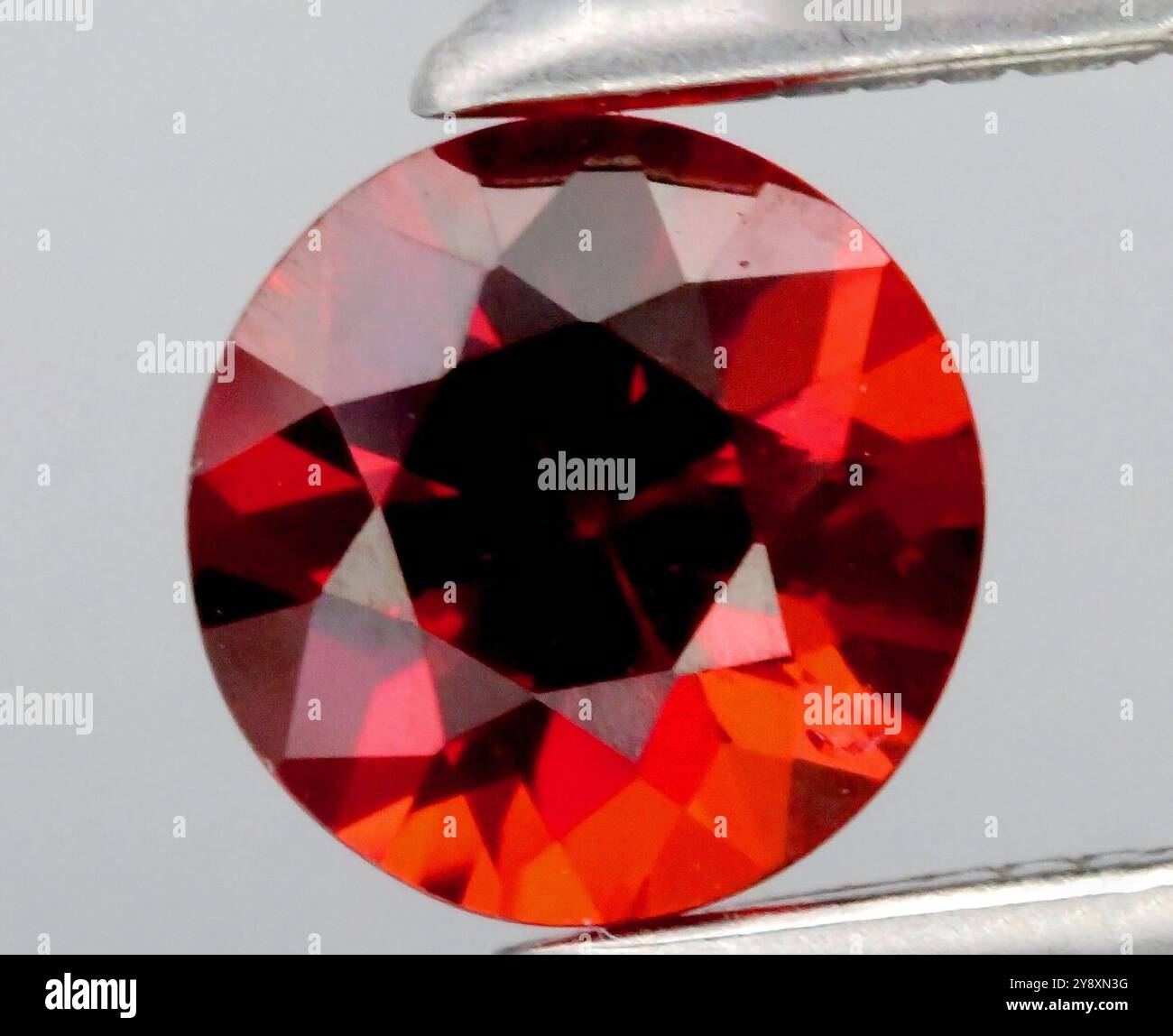 Radiant Red Gemstone Exuding Timeless Elegance Stock Photo - Alamy