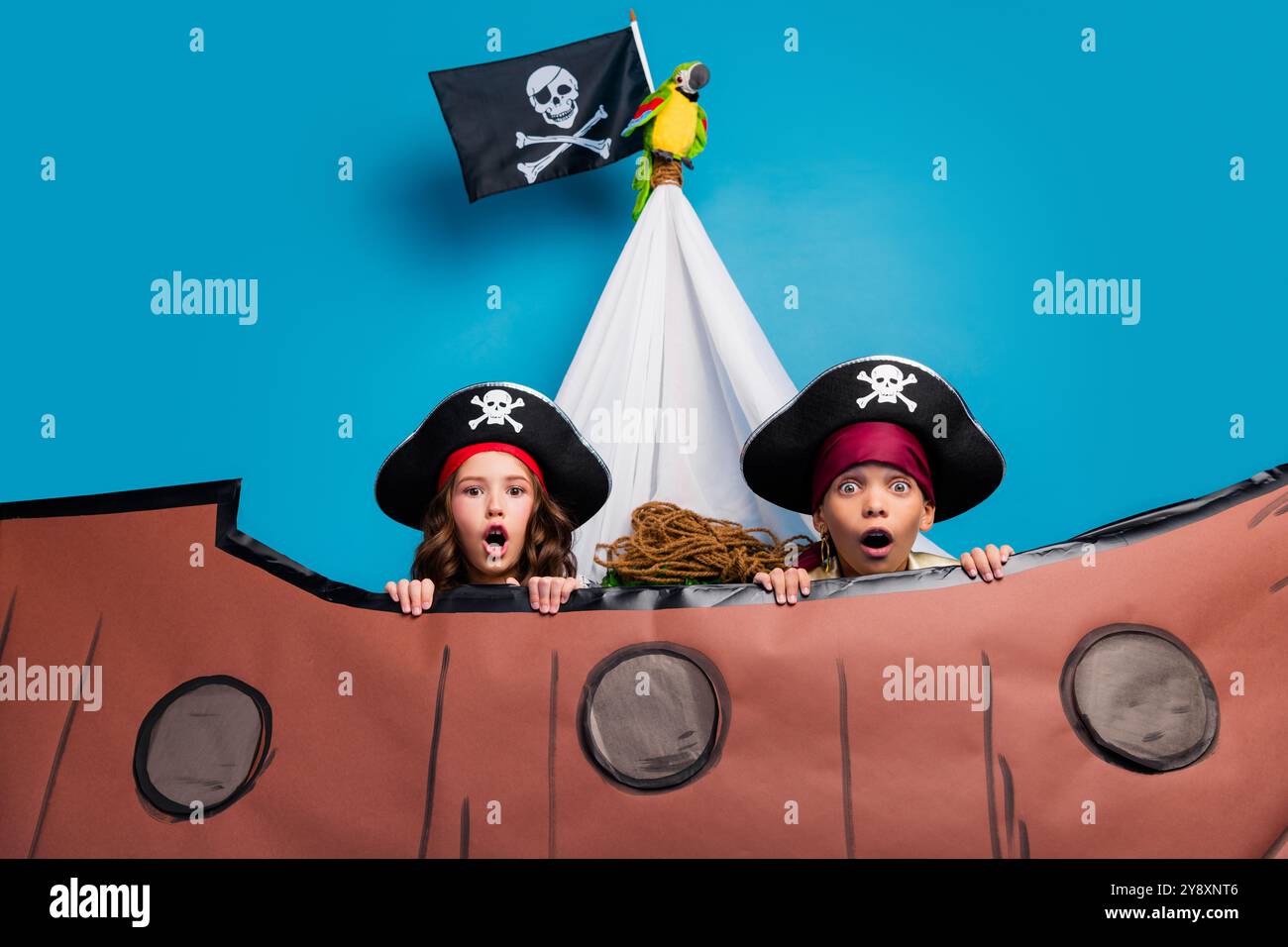 Photo portrait of cute little boy girl scared hide seek dressed pirates ...
