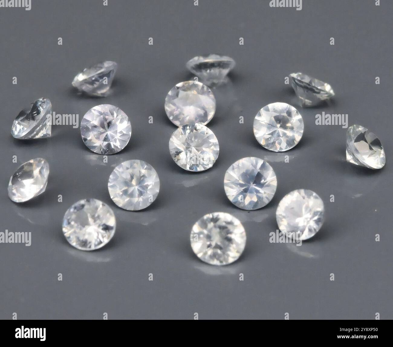A Sparkling Array of Brilliantly Cut Clear Diamonds on a Sleek Gray ...