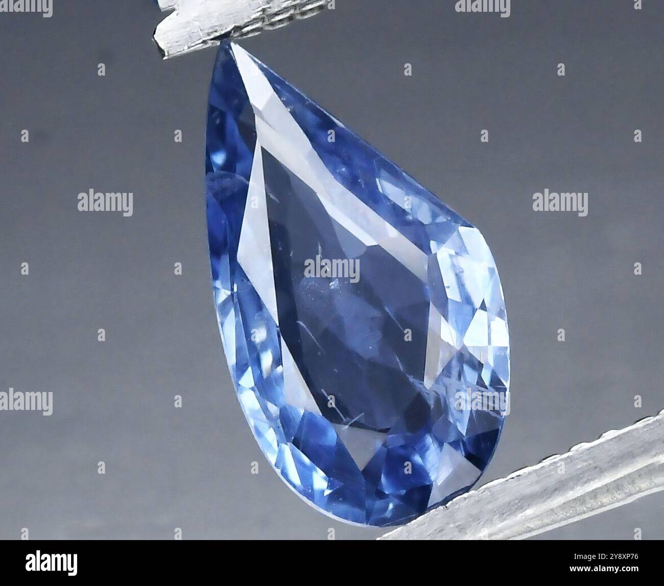 Elegant Teardrop Blue Sapphire Gemstone Glimmering in Light Stock Photo ...